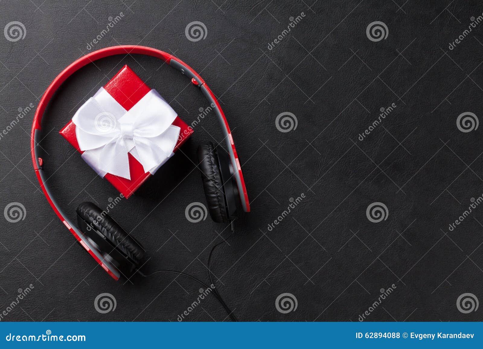 Gift box with headphones stock photo. Image of decoration - 62894088