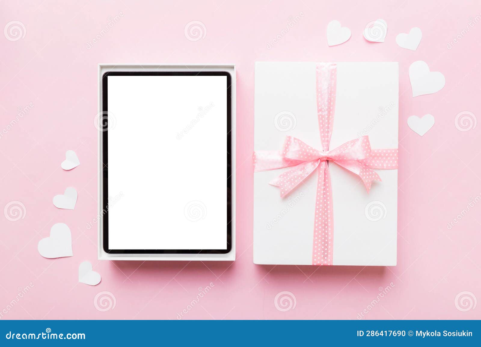 Gift Box of Open Tablet for the Holidays with a Bow Top View Stock ...