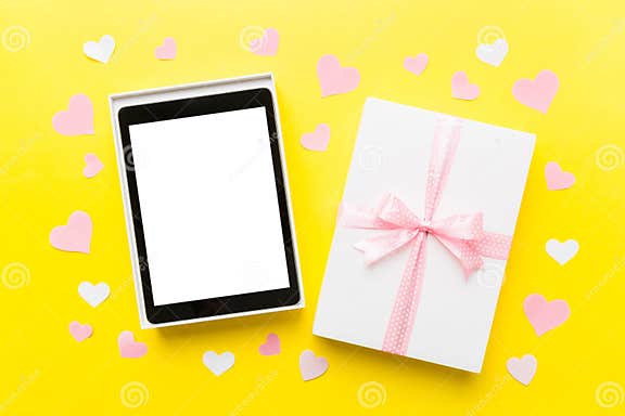 Gift Box of Open Tablet for the Holidays with a Bow Top View Stock ...