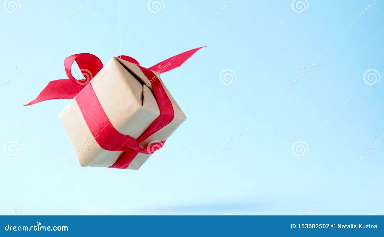 Gift Box with Red Ribbon Spinning on Blue Background. 360 Degree ...