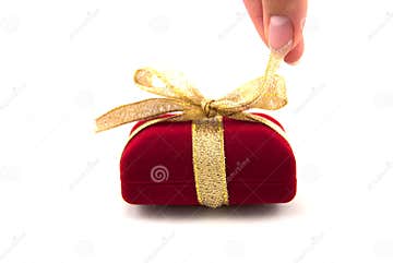 Gift box unwrapping stock image. Image of golden, ribbon - 15409849