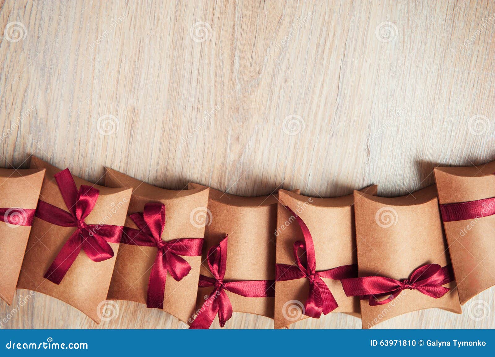 Gift Box Wrapped in Kraft Paper with Ribbon Bow Stock Photo - Image of ...