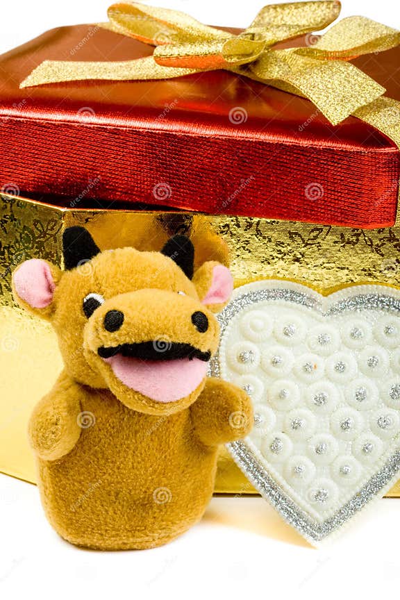 Gift box and yellow bull stock photo. Image of heart, express - 7691320