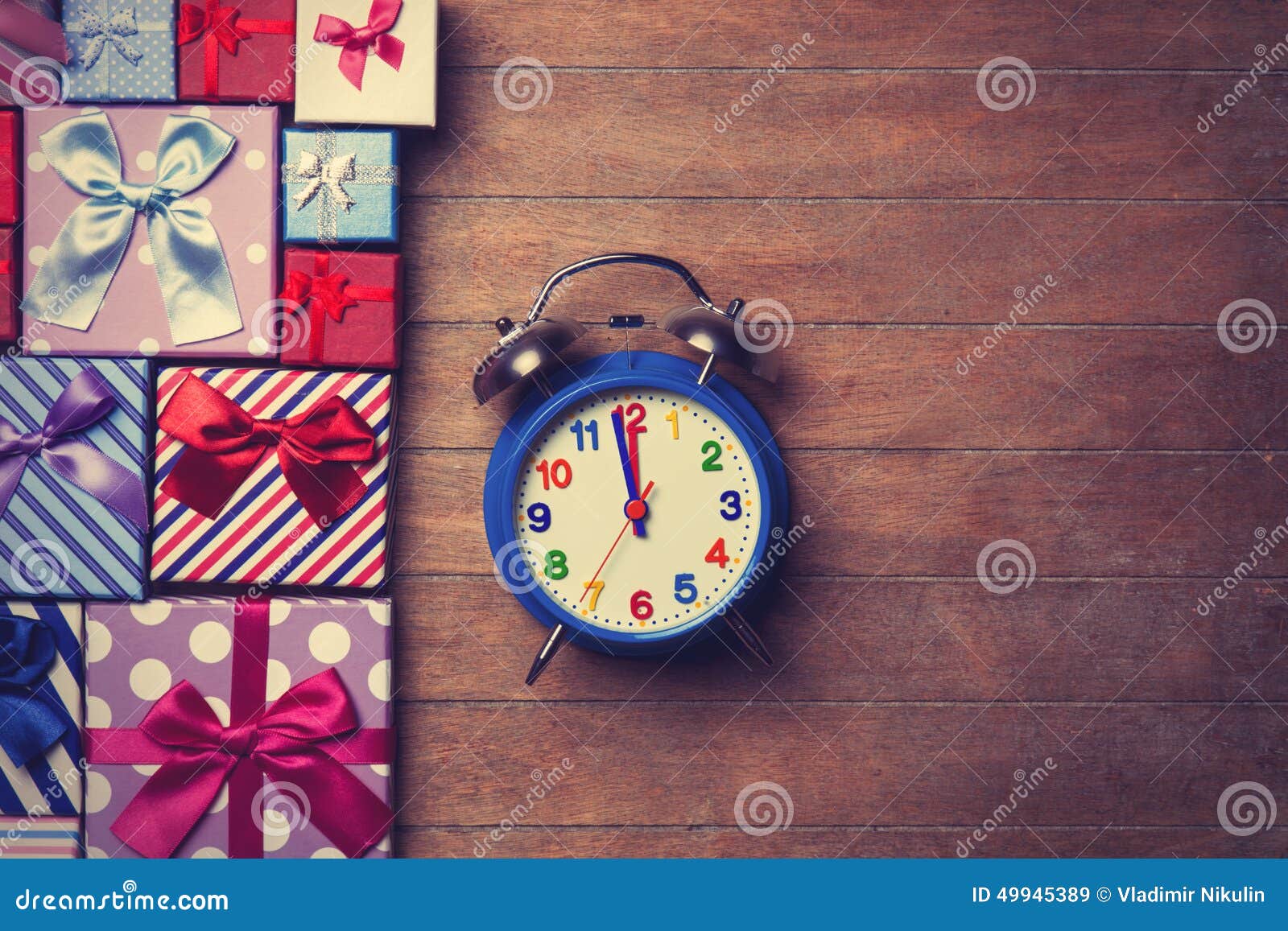 Gift boxes and alarm clock stock image. Image of alarm - 49945389
