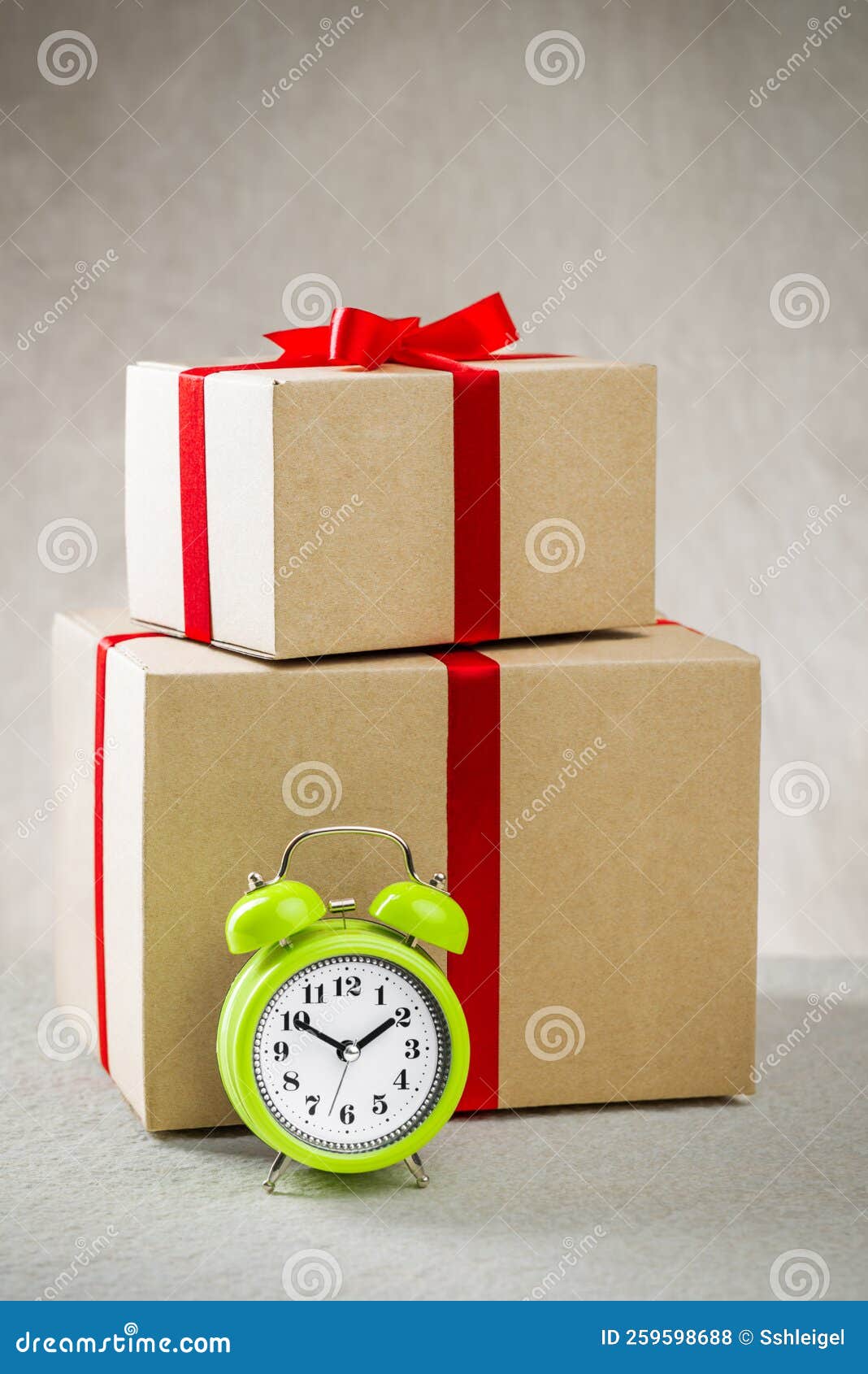 Gift Boxes and Alarm Clock. Studio Shot from a Low Angle Stock Photo ...