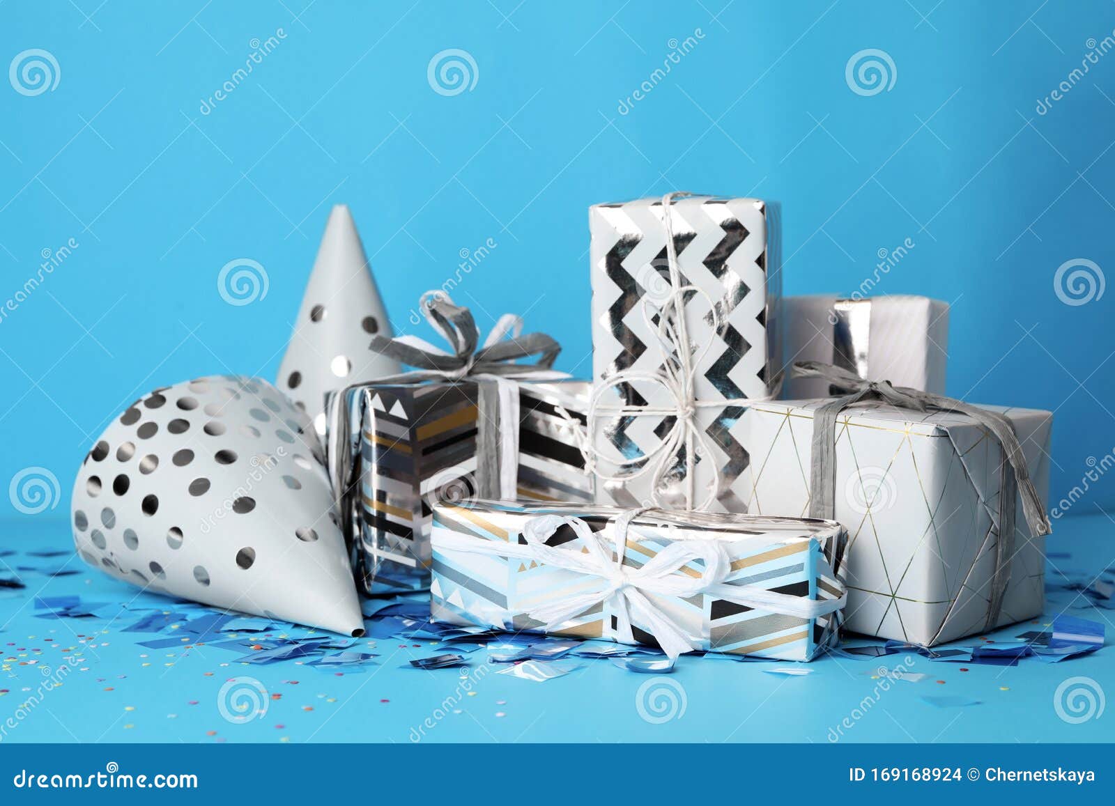 Gift Boxes and Birthday Decor on Light Blue Stock Photo - Image of ...