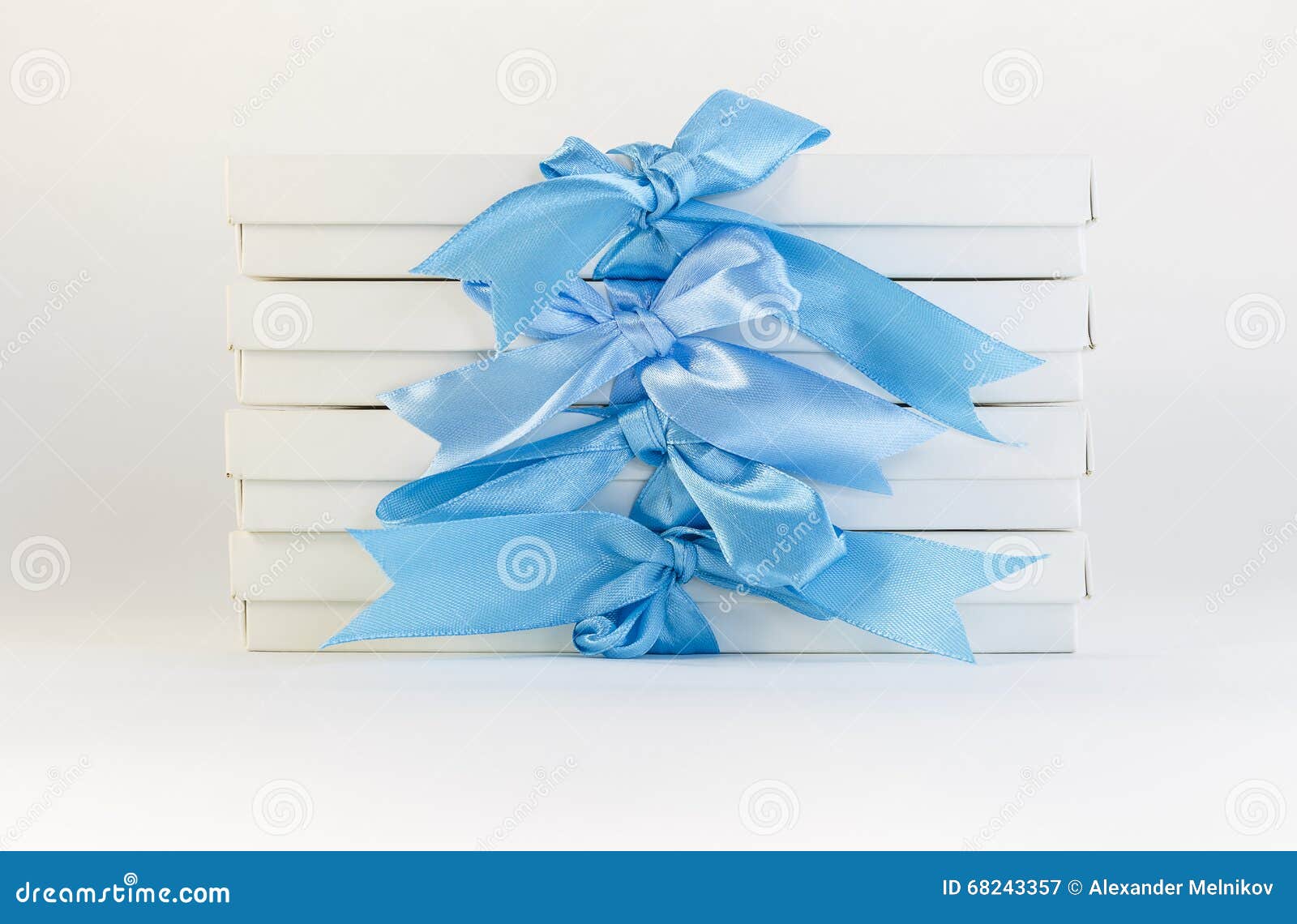 Gift Boxes with Blue Ribbons on a White Background Stock Image - Image ...