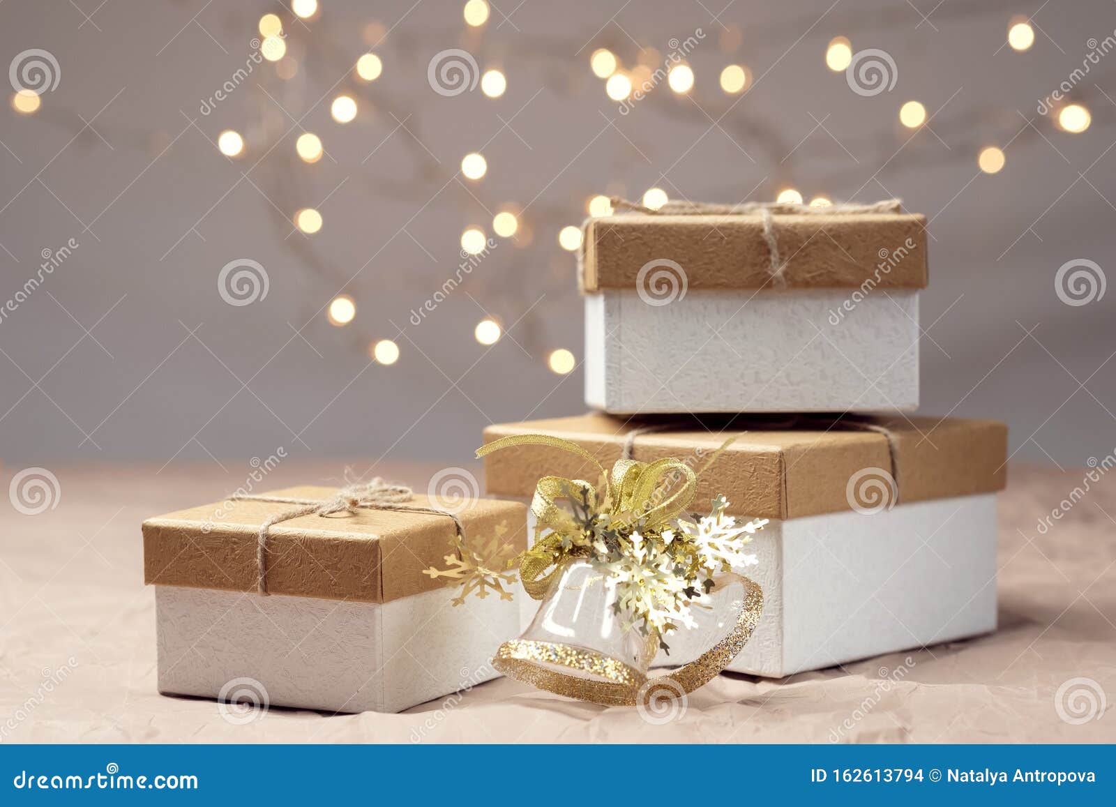 Gift Boxes in Brown Color on the Background of Lights Stock Photo ...