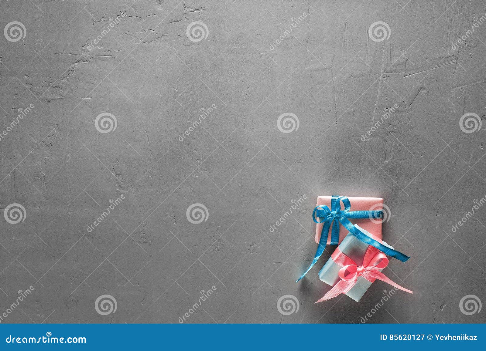 Gift Boxes in Craft Paper on a Concrete Background Stock Image - Image ...