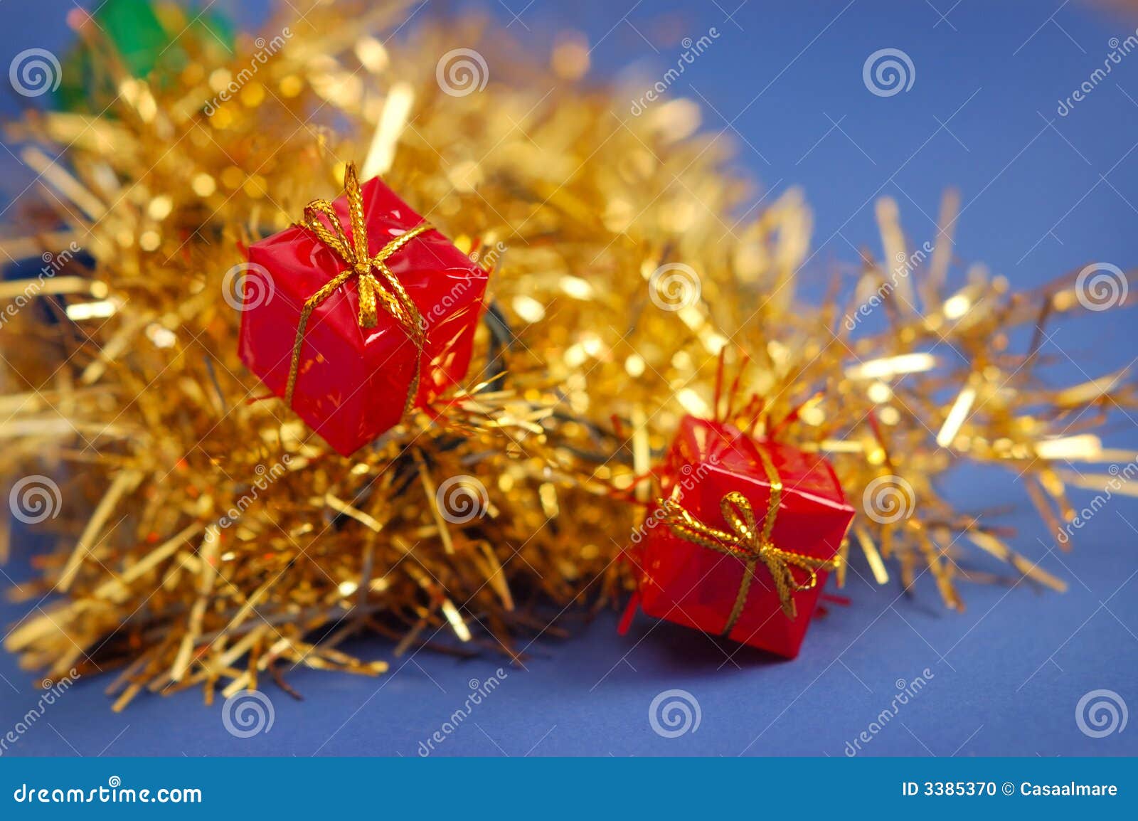 Gift boxes on gold garland stock photo. Image of festive - 3385370