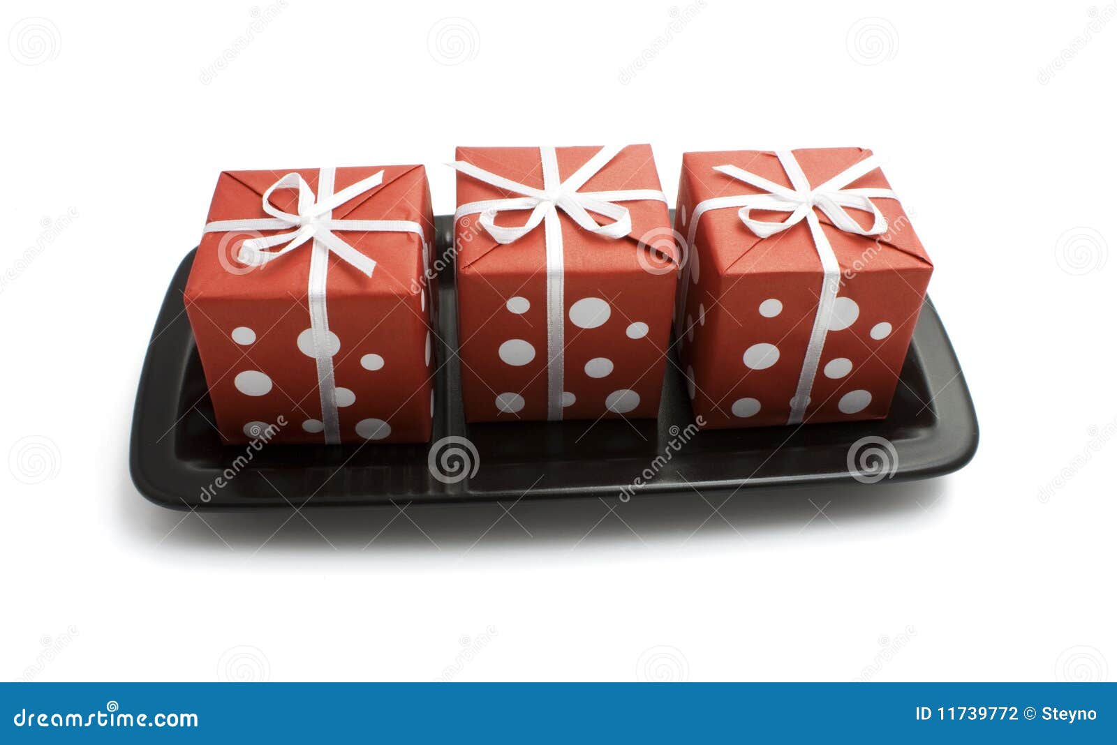 Gift boxes on a plate stock photo. Image of decorate - 11739772