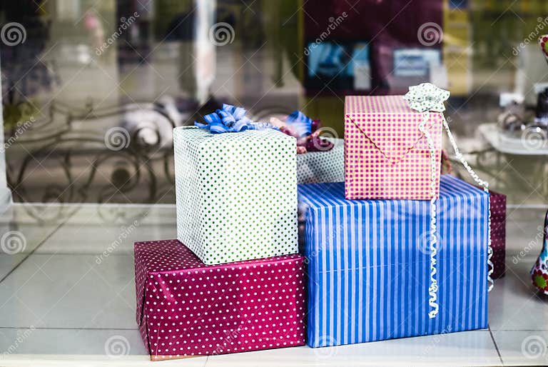 Gift boxes in shop window stock photo. Image of christmas - 97397772