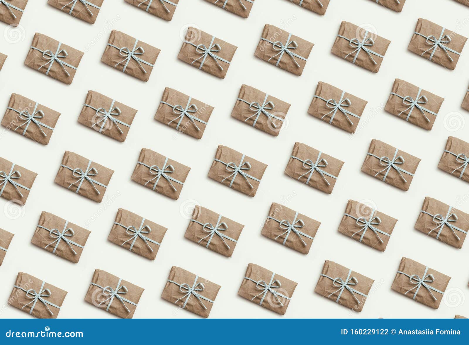 Gift Boxes Wrapped in Craft Paper and Tie. White Solid Background ...