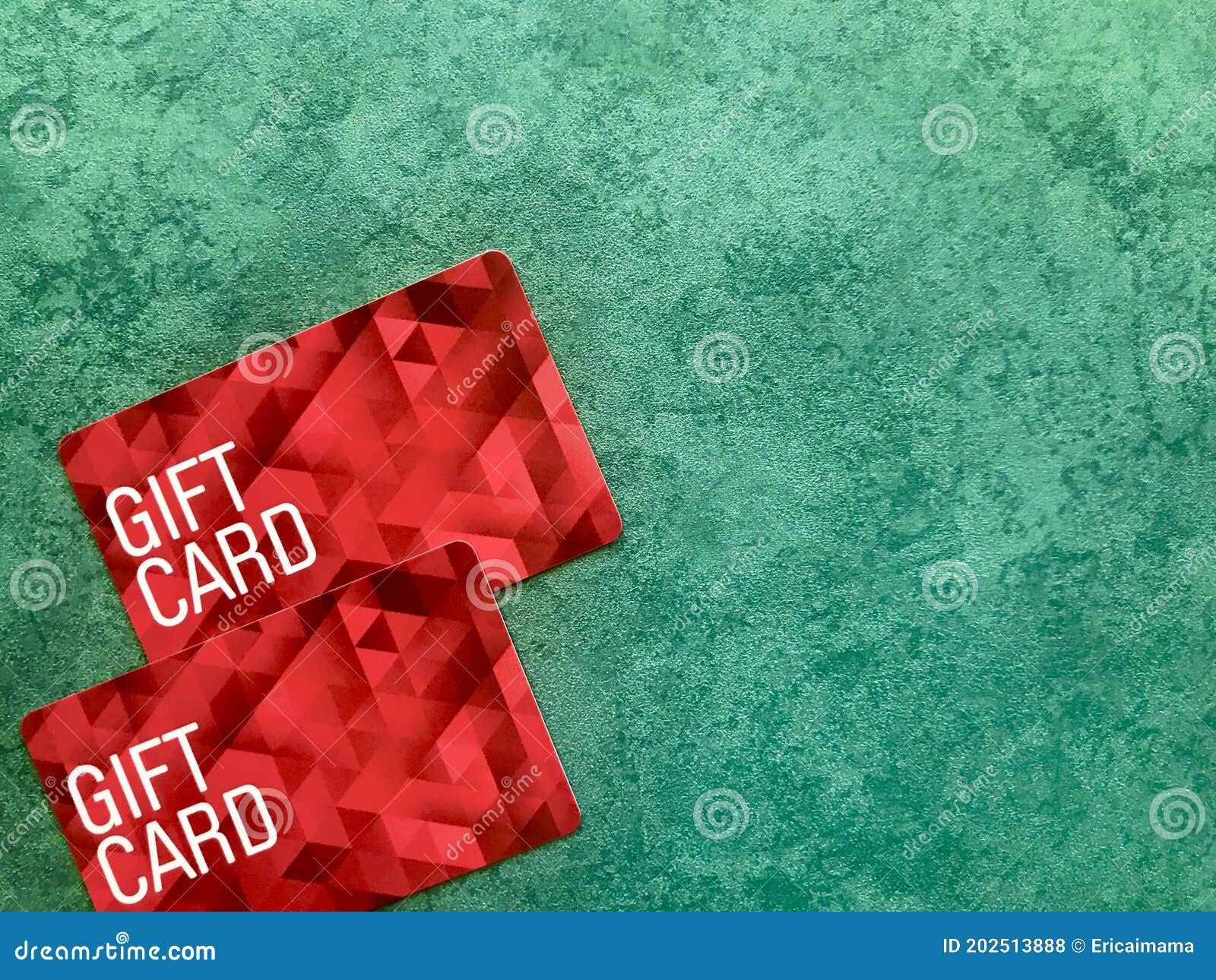 A Red Gift Card on Green Background. Stock Photo - Image of beneficial ...