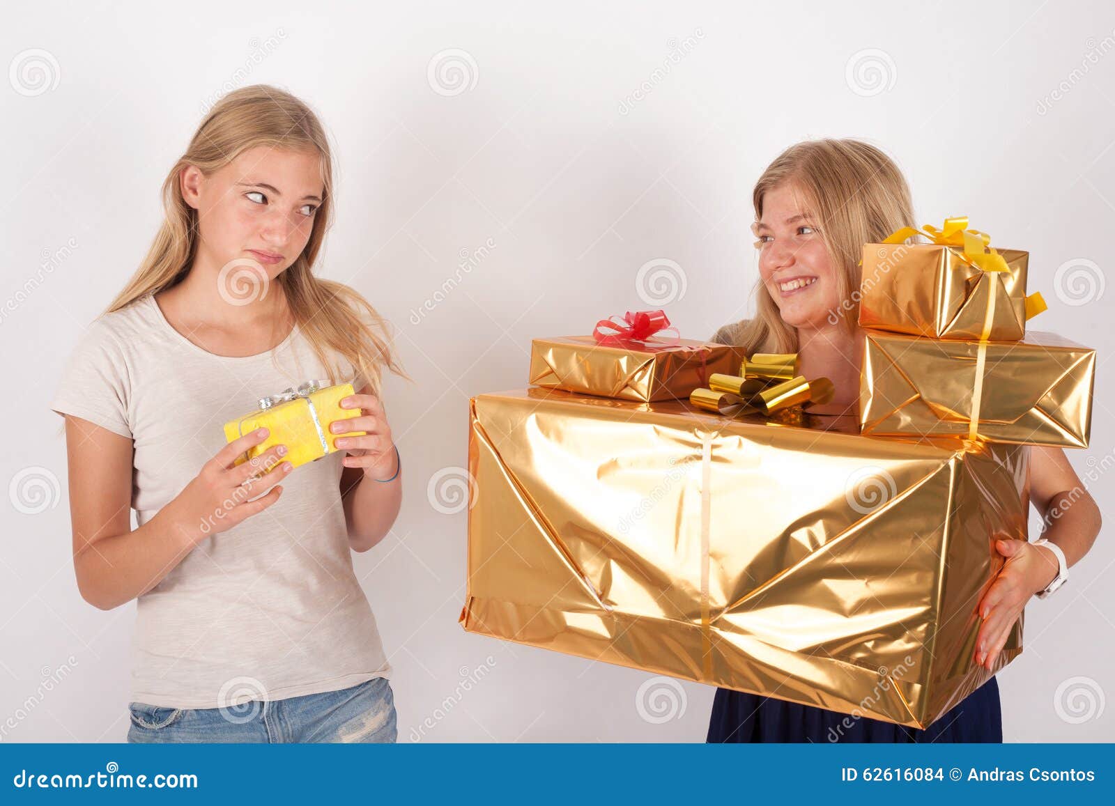 Gift Comparison - Loser And The Winner. Small And Big Gift Boxes Stock ...