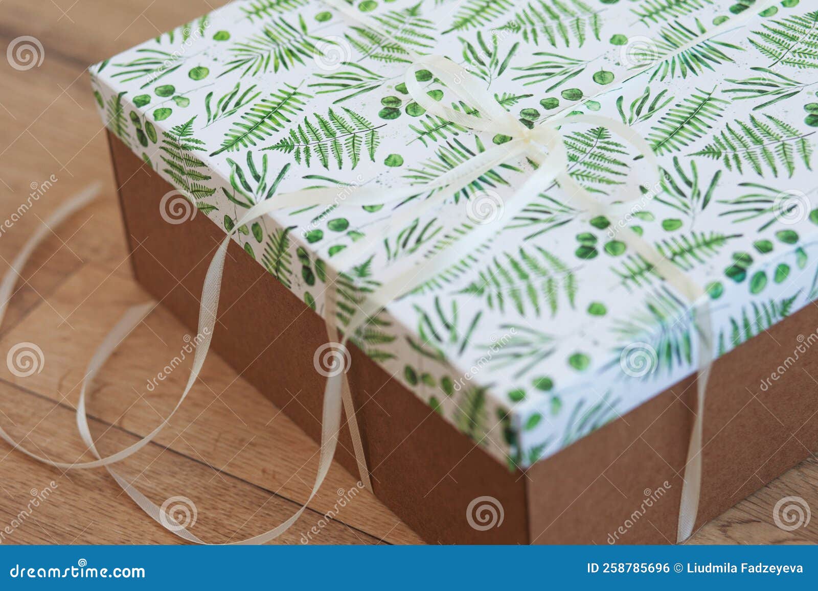 Gift in Craft Paper on a White Textile Background. Wrapped Parcels, Top ...