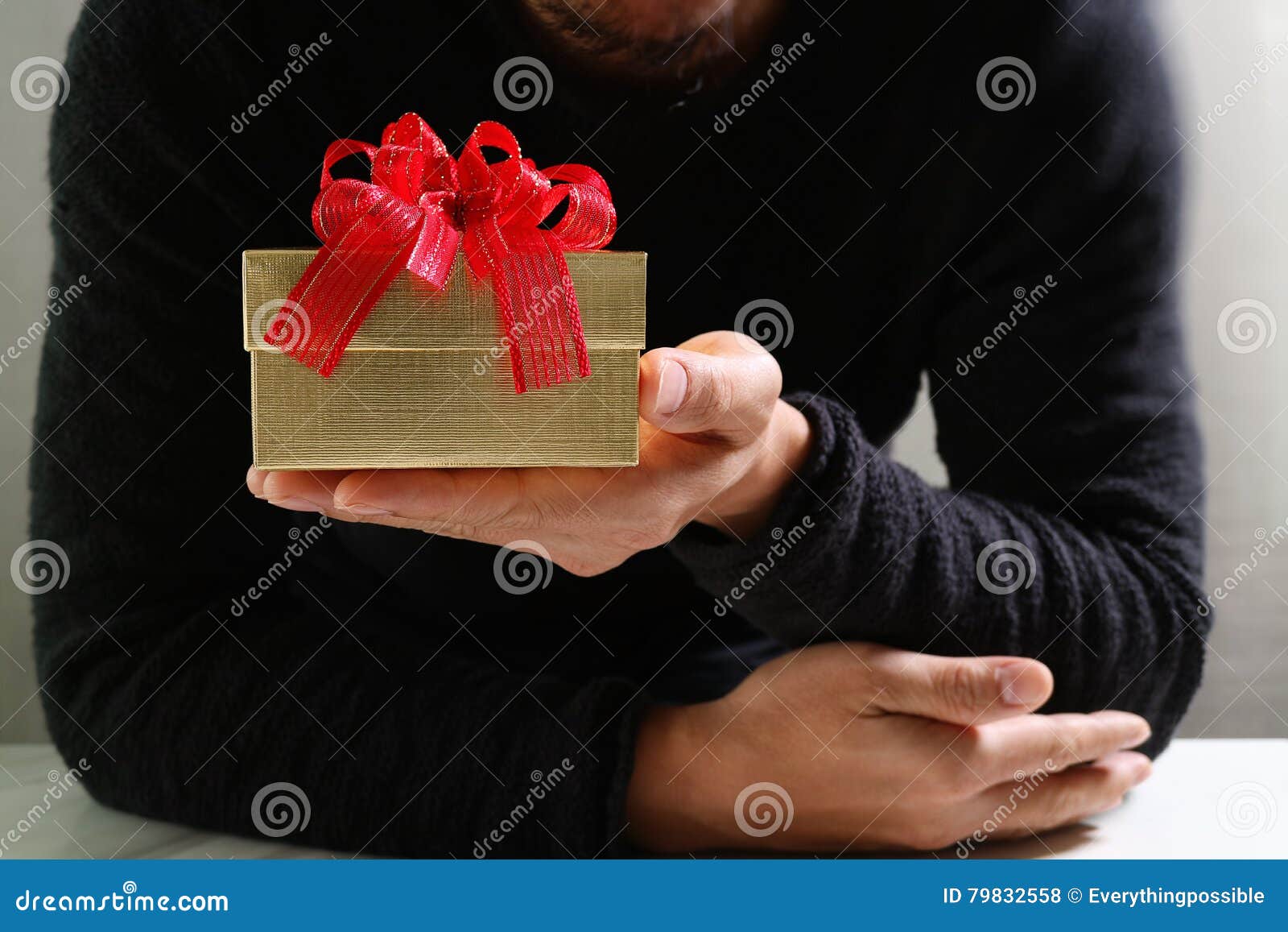 Gift Giving,man Hand Holding a Gift Box in a Gesture of Giving.blurred ...