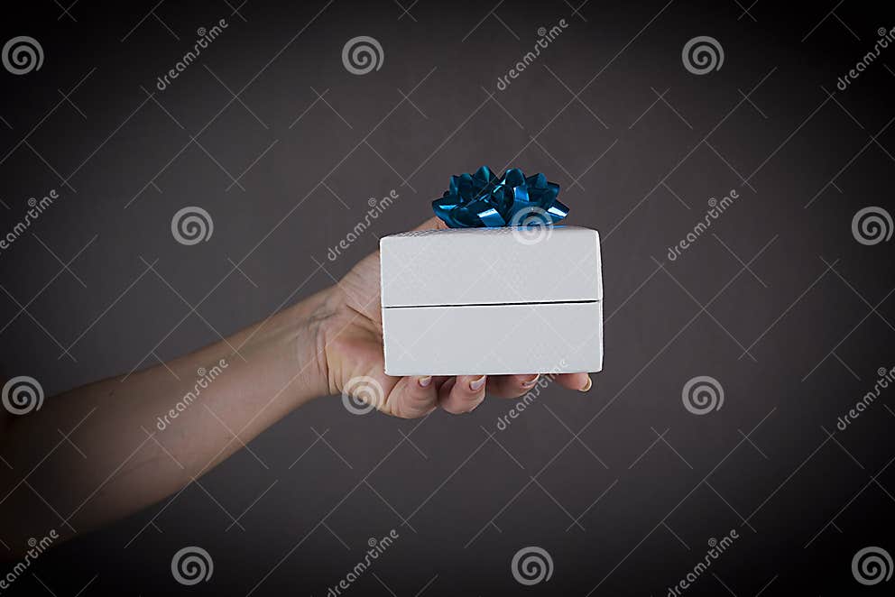 Gift in hand stock photo. Image of event, anniversary - 190732948