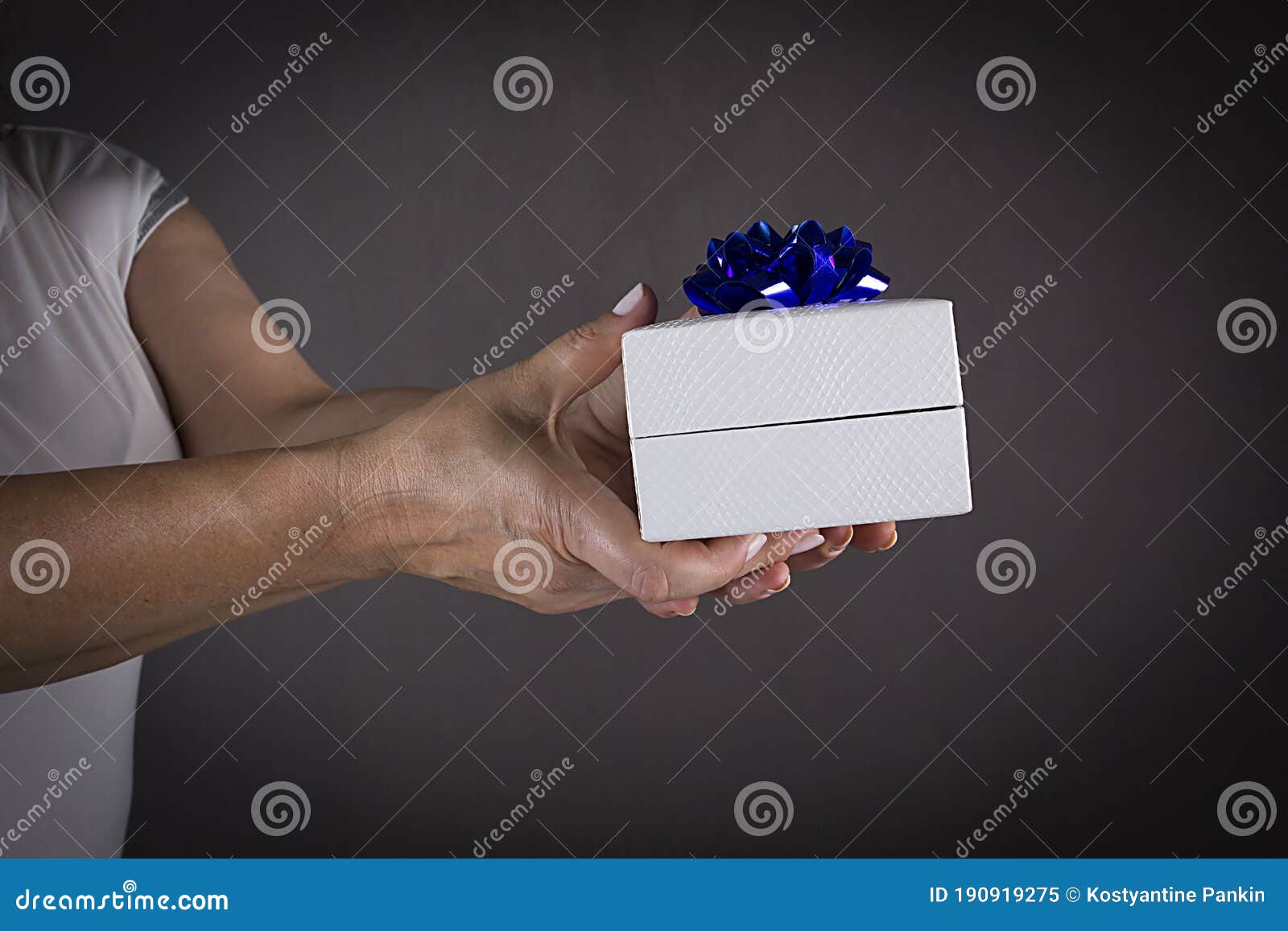Gift in hand stock image. Image of birthday, festive - 190919275