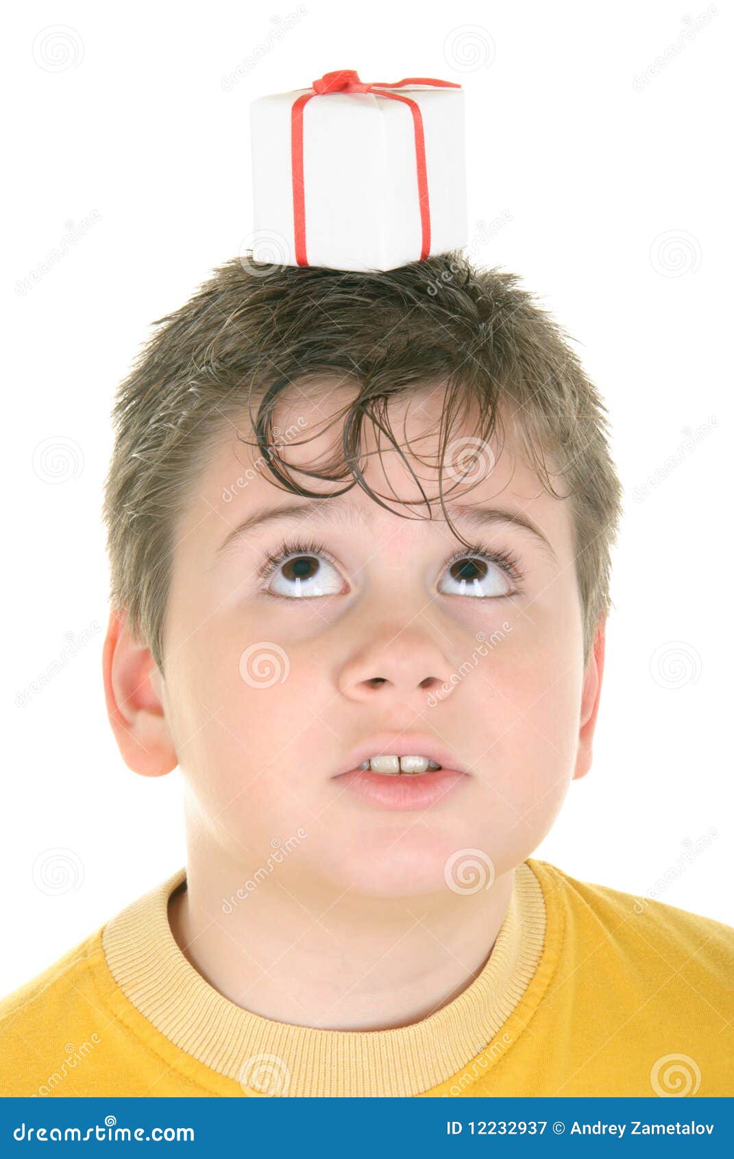 Gift on head at the boy stock image. Image of person - 12232937