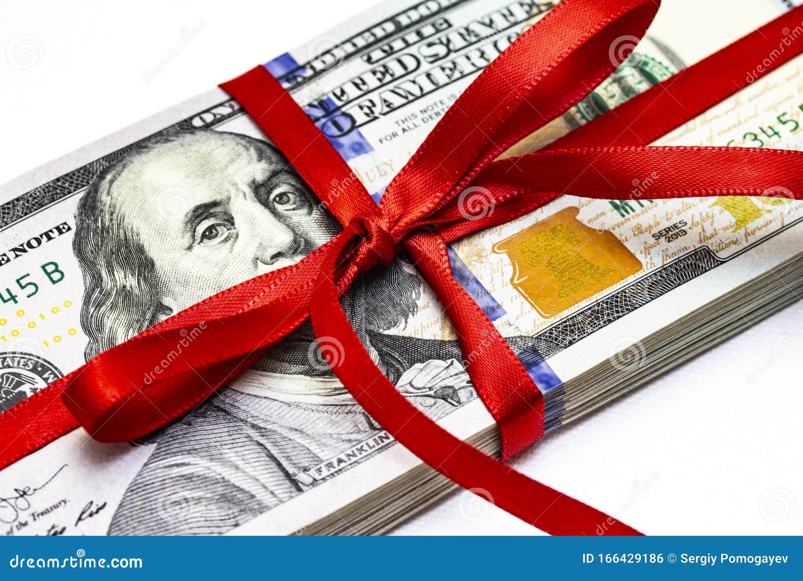 Gift of Money. Stack of Dollar Bills with Red Ribbon Isolated on White ...