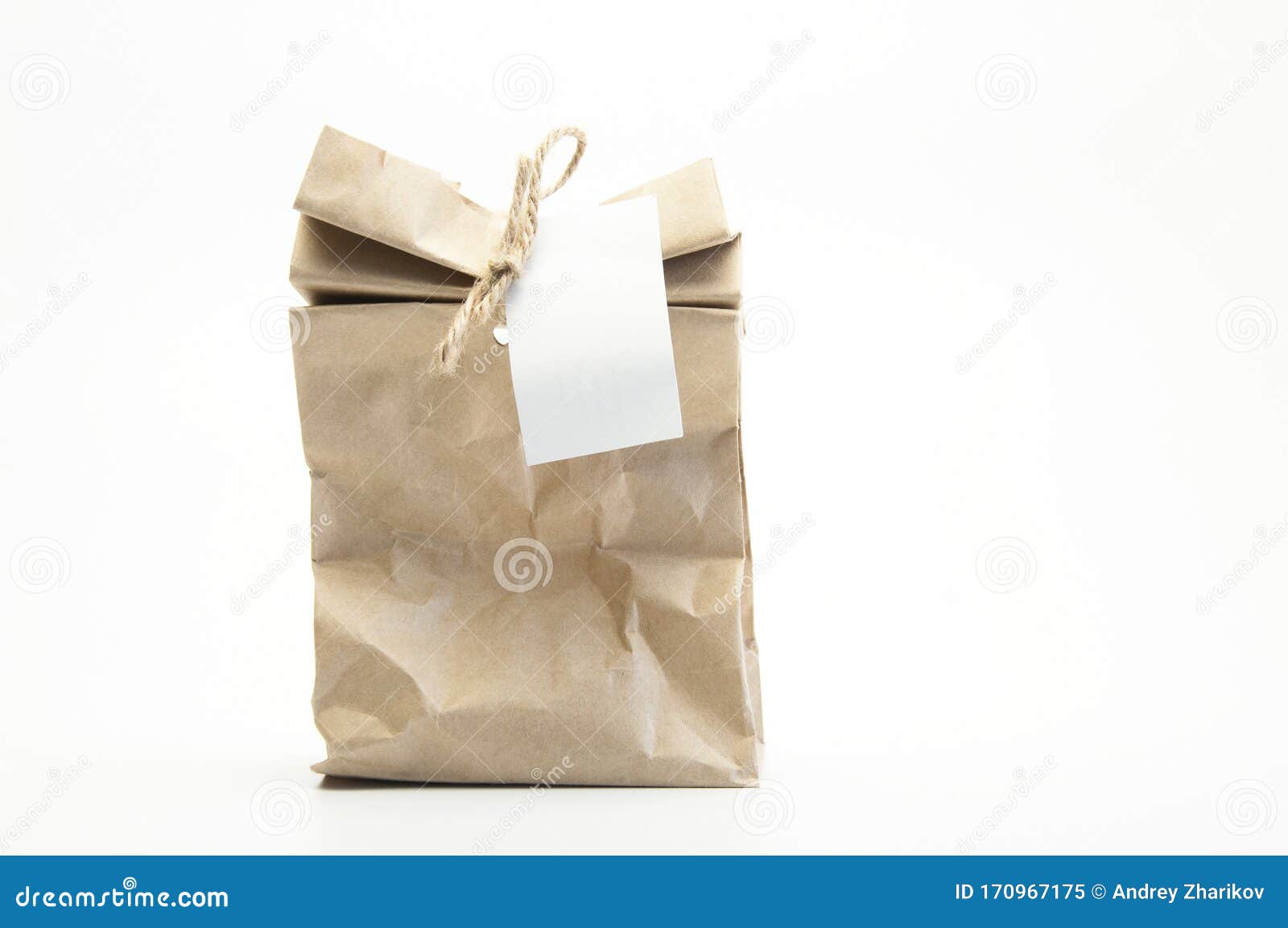 Gift Paper Parchment Bag with Bow and Note. on White Background Stock ...