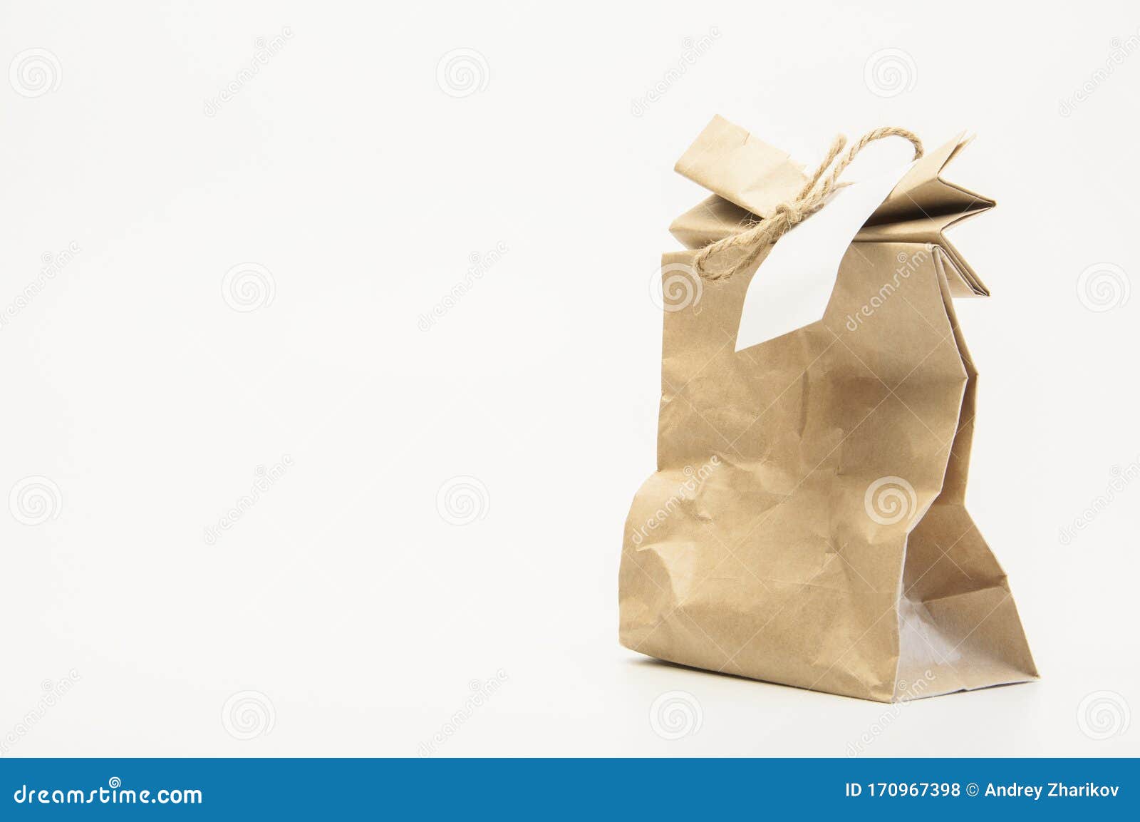 Gift Paper Parchment Bag with Bow and Note. on White Background Stock ...