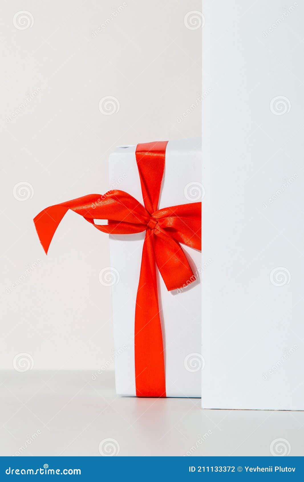Gift with a Red Ribbon on a White Background, the Concept of the ...