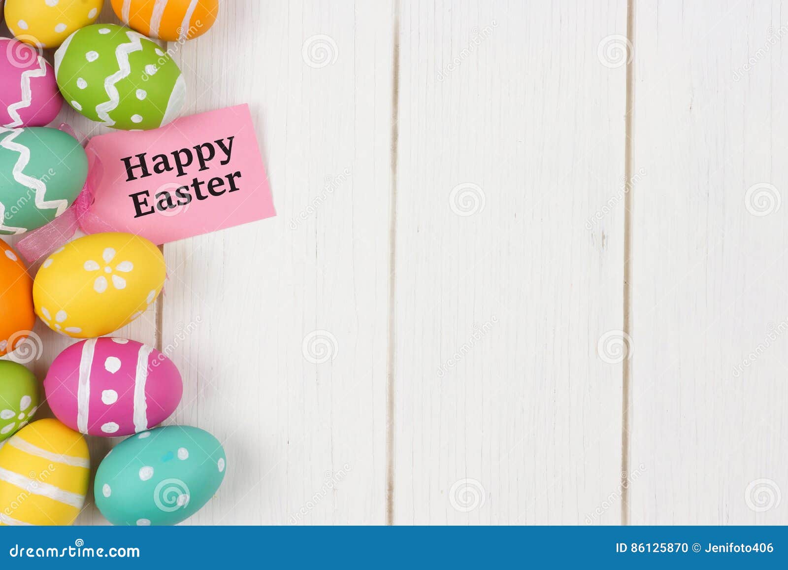 Easter Egg Side Border Against Yellow Wood Stock Photo