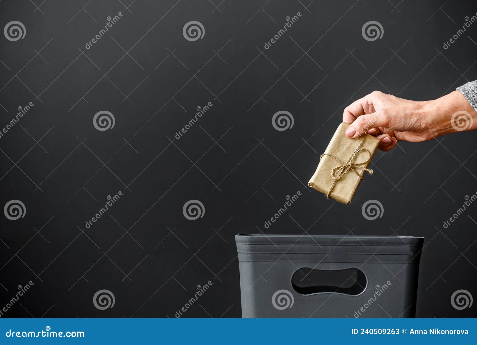 Gift is Thrown into the Trash. the Concept of Recycling Stock Image ...