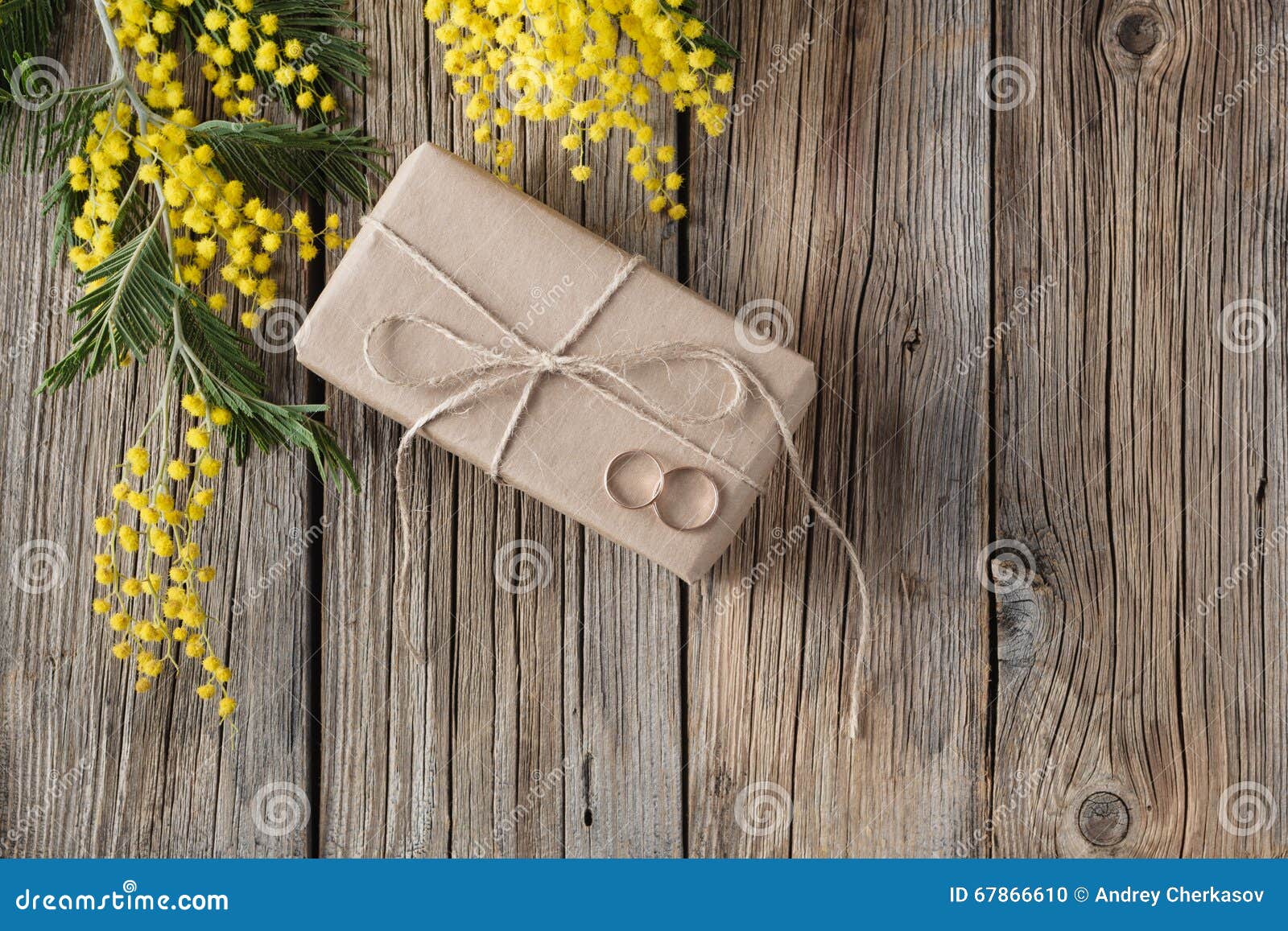 Gift Wrapped in Craft Paper with Yellow Spring Flower Stock Photo ...