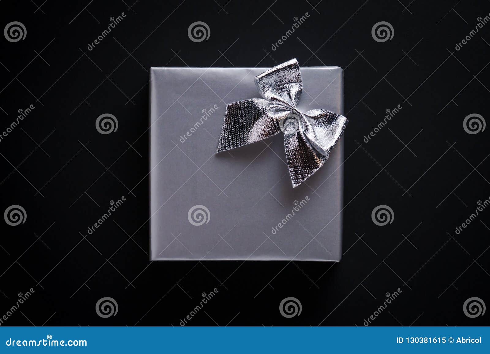 Gift Wrapped in Silver Paper, Decorated with Silver Shining Bow Stock ...