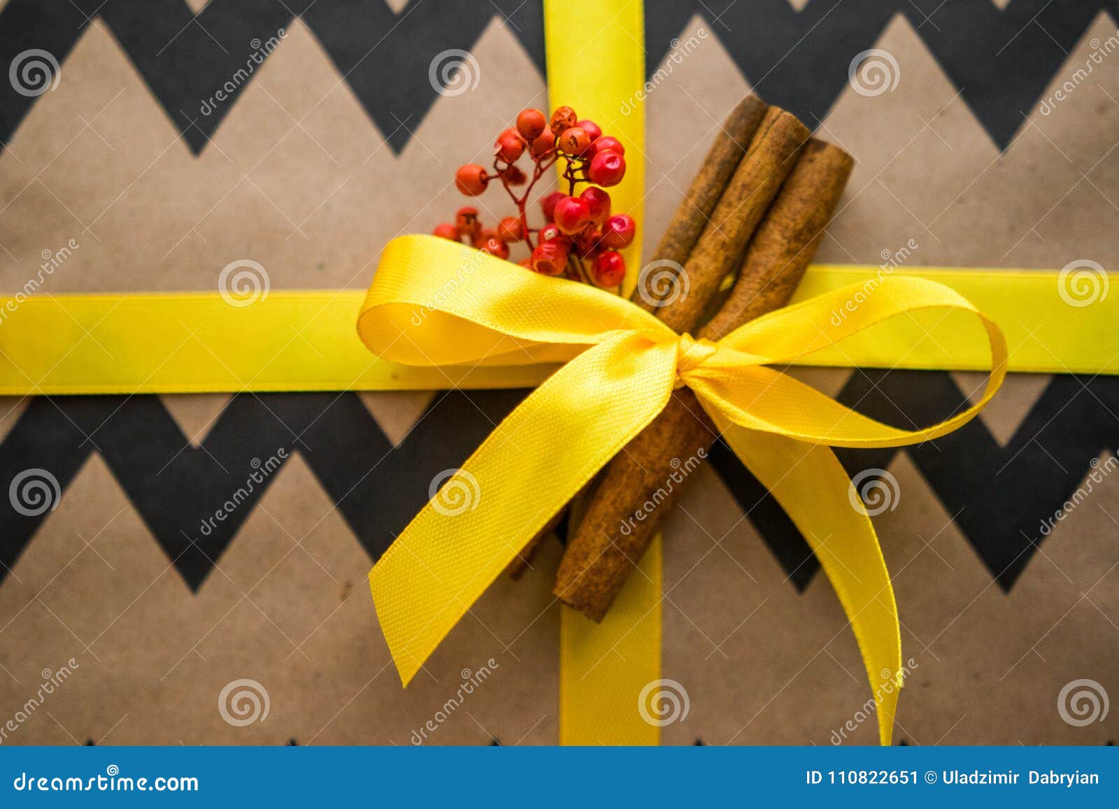 Gift with a Yellow Ribbon / Gift Box Tied with a Yellow Ribbon Stock ...