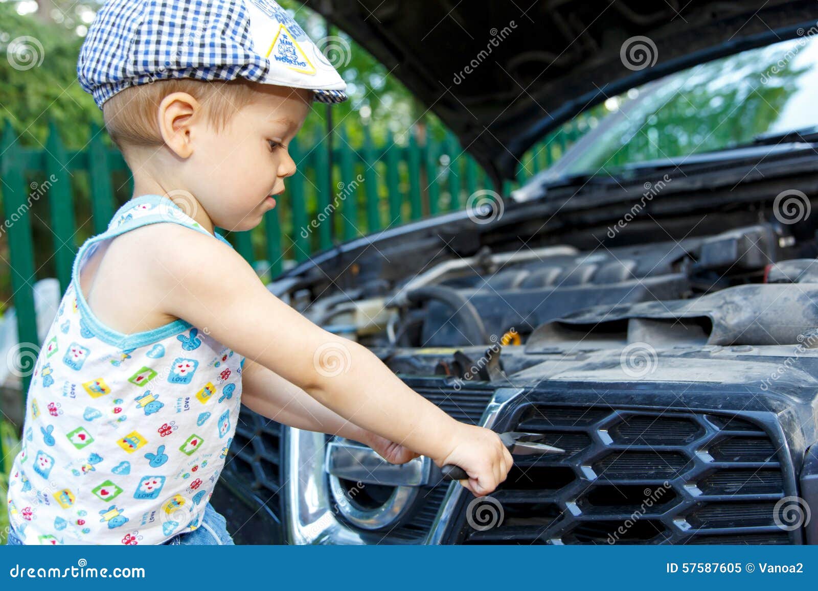 Gifted Kid Repairing Car Engine Stock Image - Image of holding, repair ...