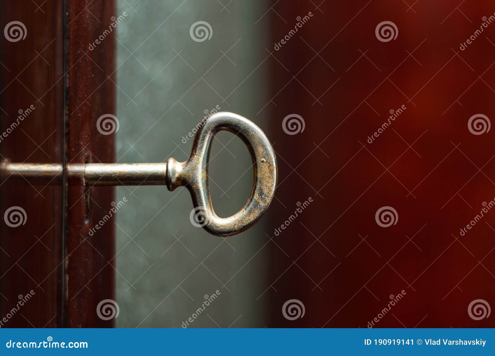 Gilded Key in the Lock Hole of a Home Cabinet Stock Image - Image of ...