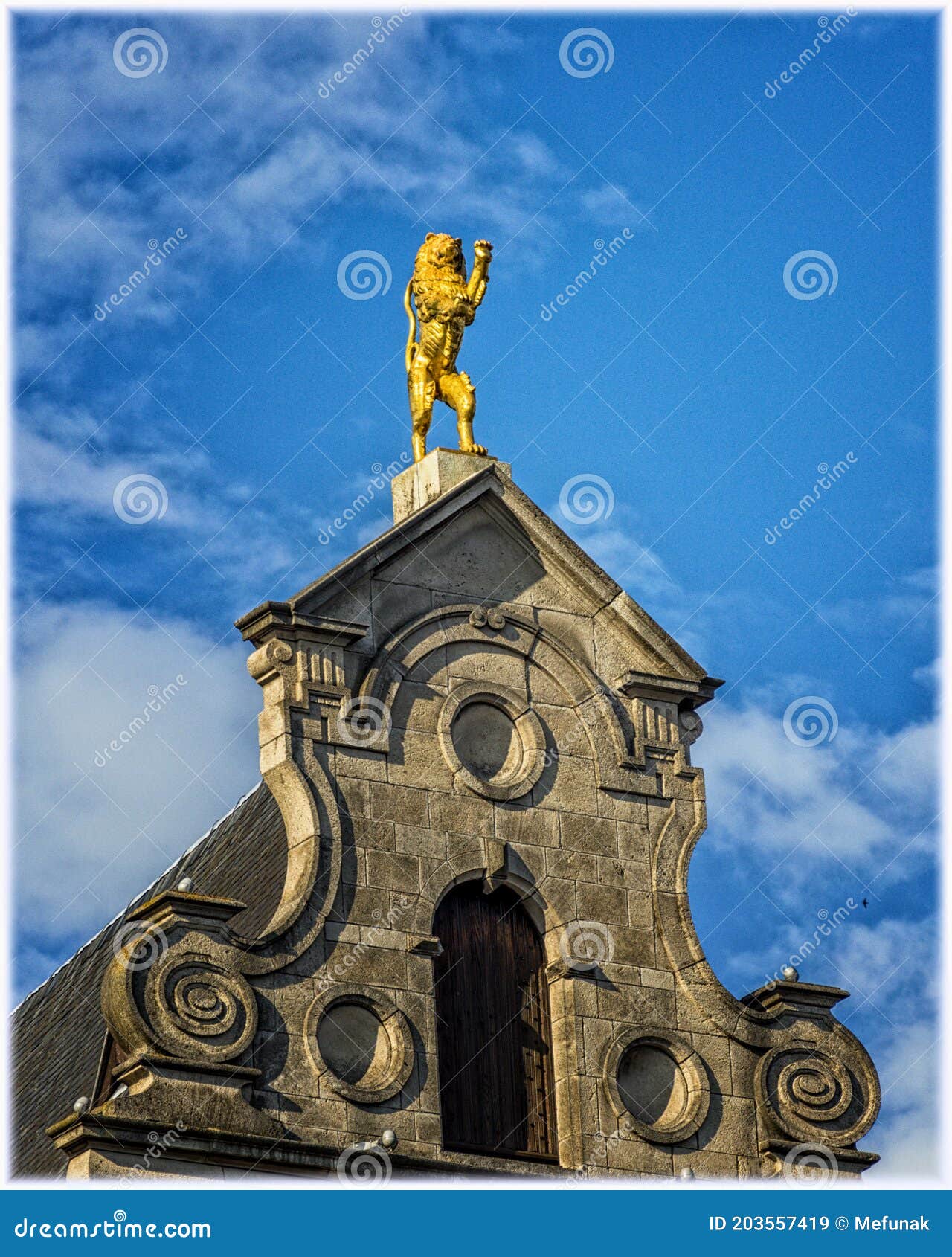 The Gilded Statue on the Top of Guild Houses in Antwerp, Belgium Stock ...