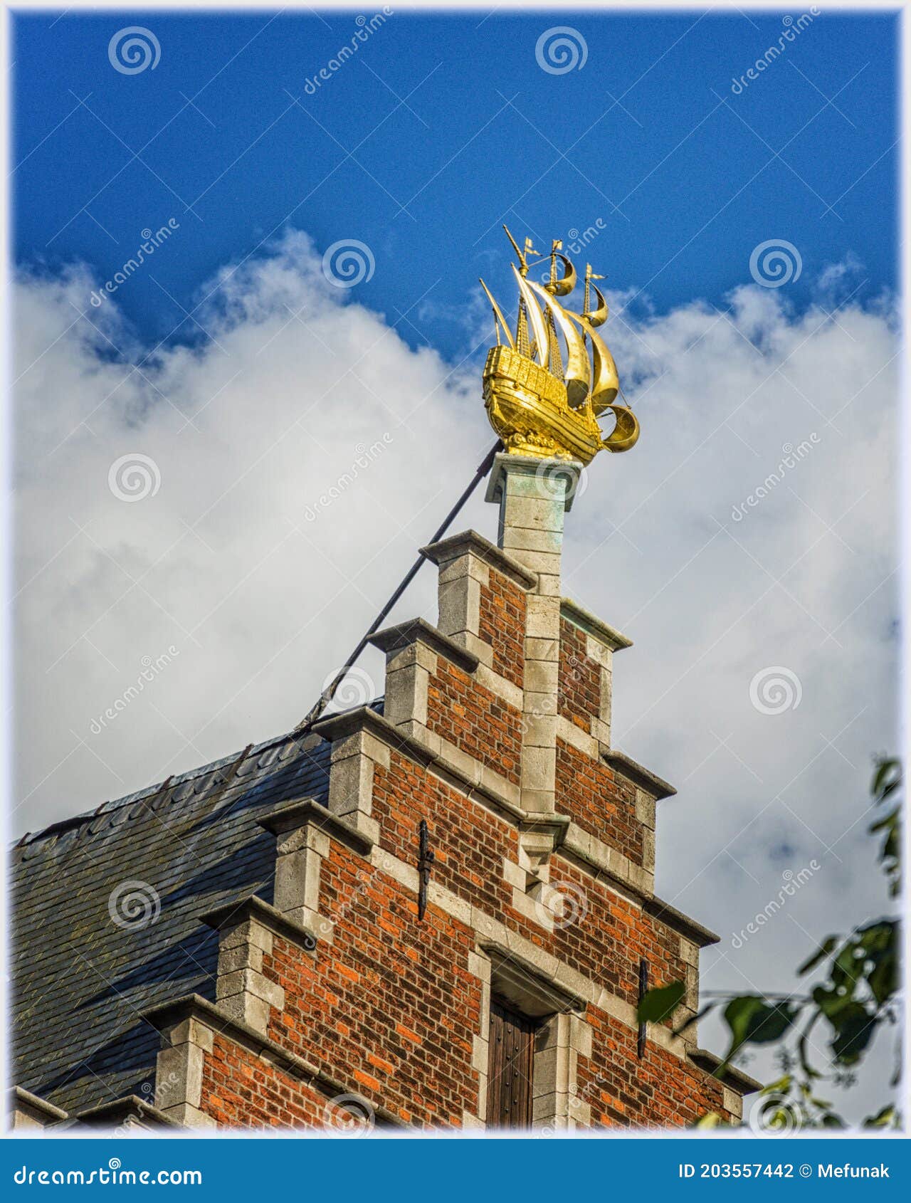 The Gilded Statue on the Top of Guild Houses in Antwerp, Belgium Stock ...
