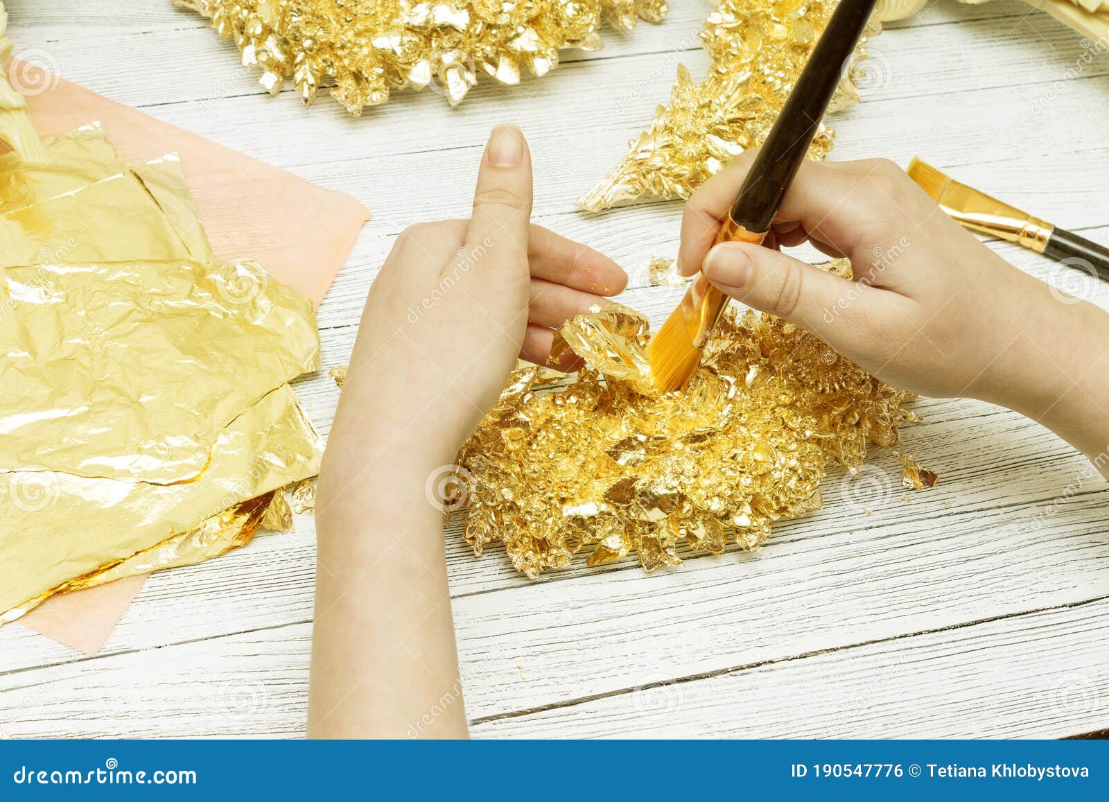Gilding Process. Female Hands with a Brush Stock Photo - Image of hold ...