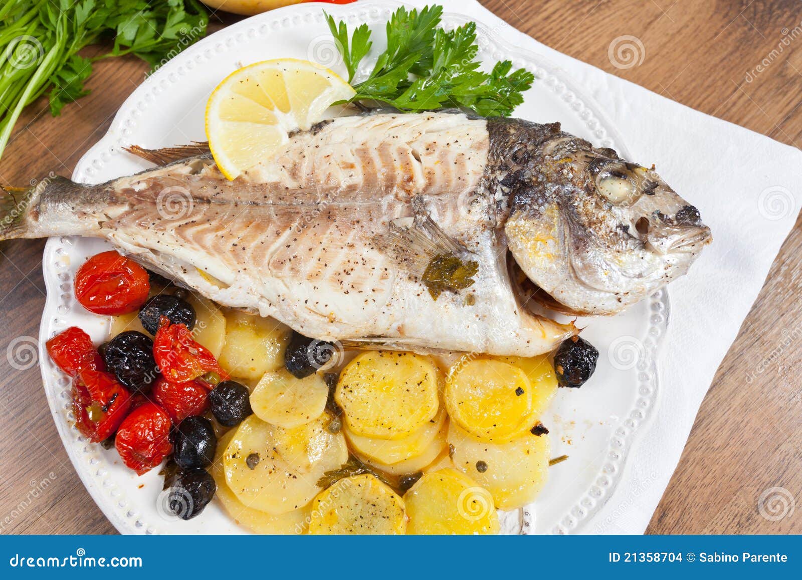 Gilthead fish stock photo. Image of potatoes, seafood - 21358704