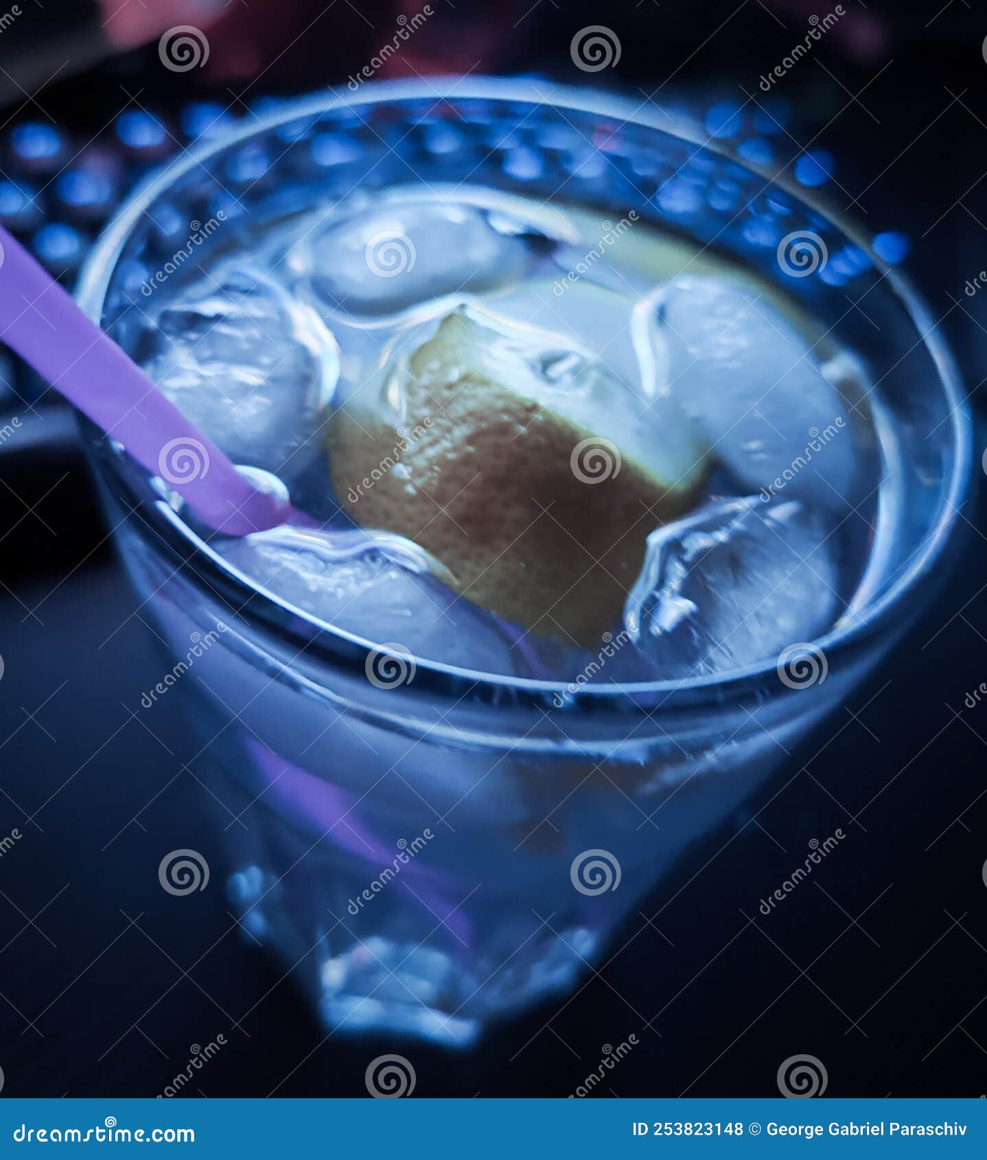 Gin cocktail at night stock photo. Image of illuminated - 253823148