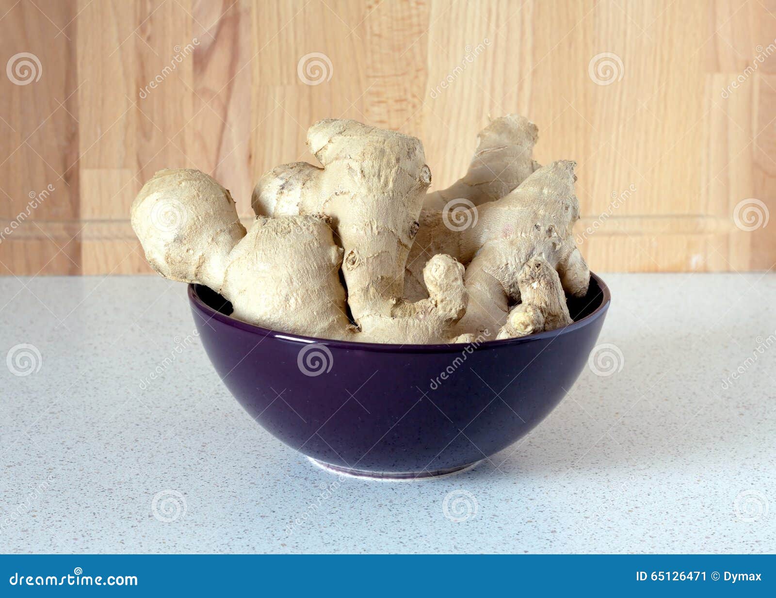 Ginger in Dark Bowl on on Kitchen Table Closeup Stock Image - Image of ...