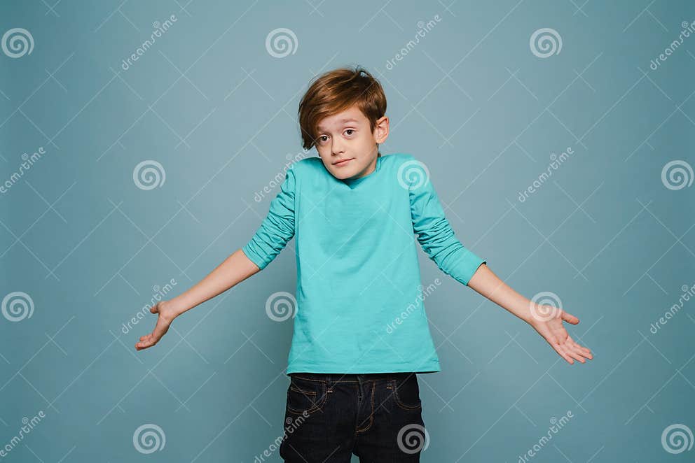 Ginger Perplexed Boy Gesturing and Looking at Camera Stock Photo - Image of people, teenager ...