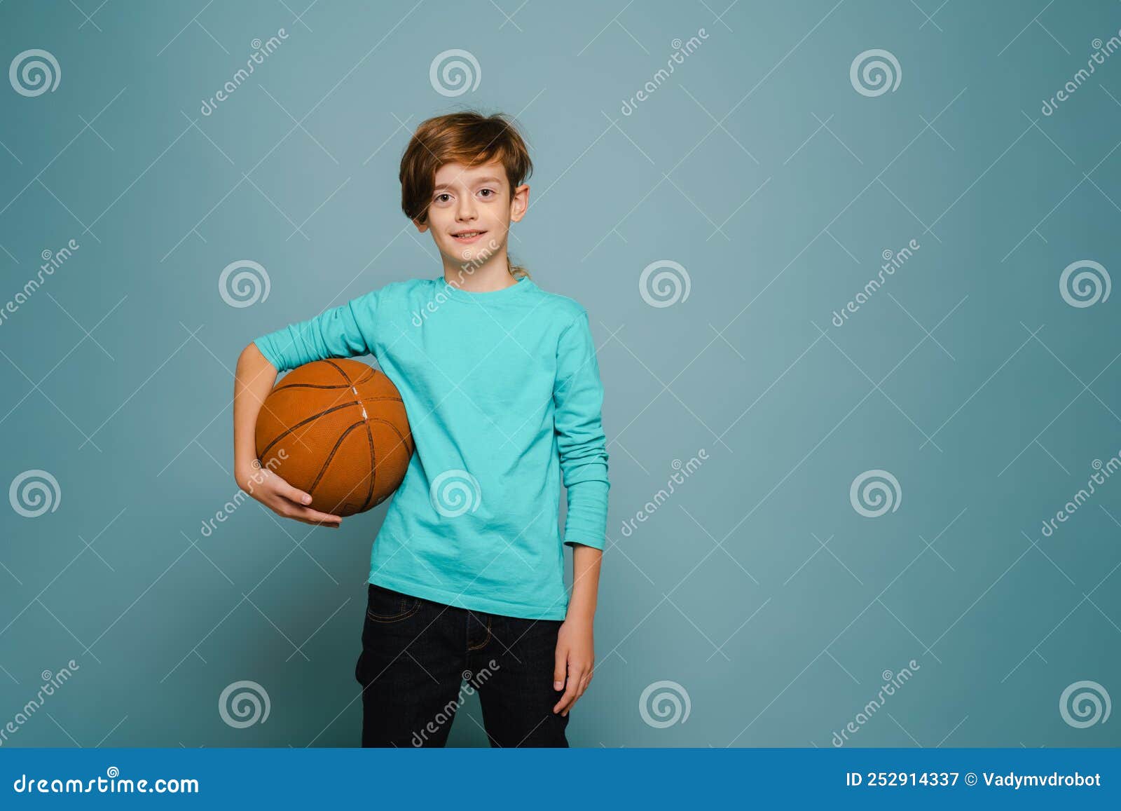 Ginger White Boy Smiling while Posing with Basketball Stock Image ...
