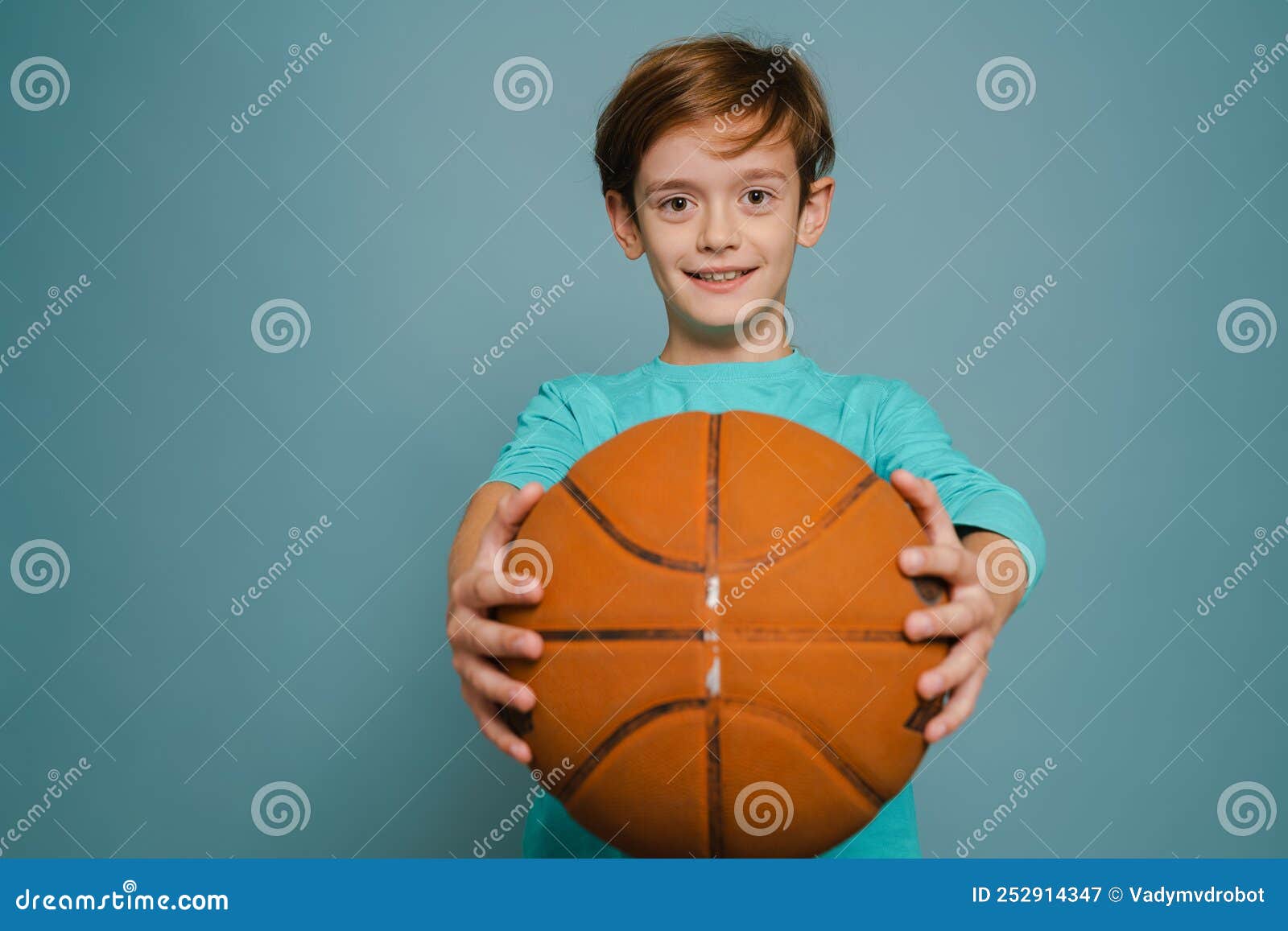 Ginger White Boy Smiling while Posing with Basketball Stock Image ...