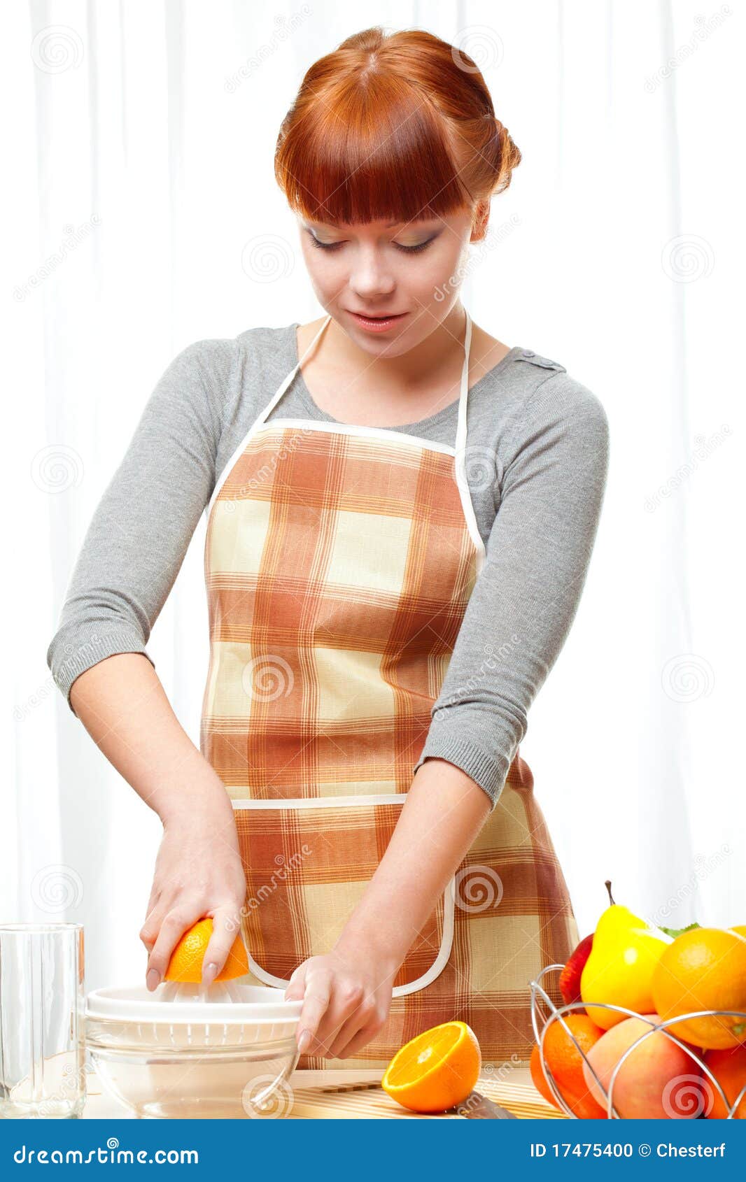 Ginger woman at kitchen stock photo. Image of female - 17475400