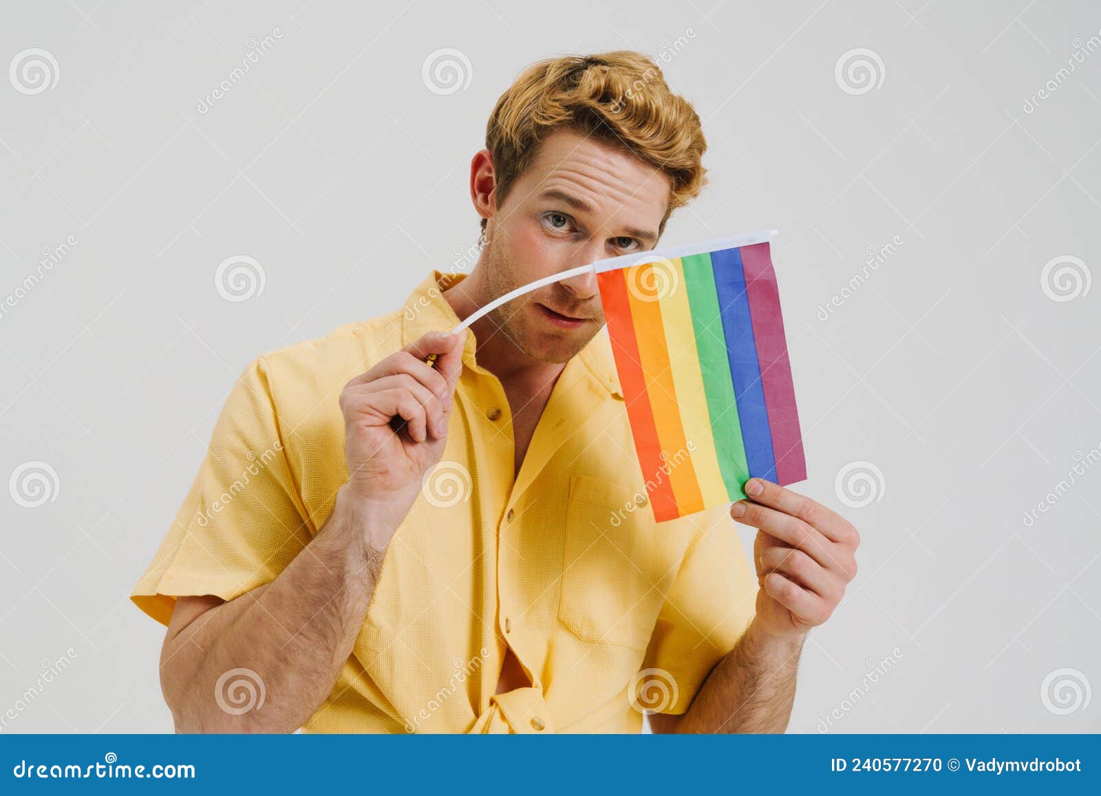 Ginger Young Man Looking at Camera and Posing with Rainbow Flag Stock ...