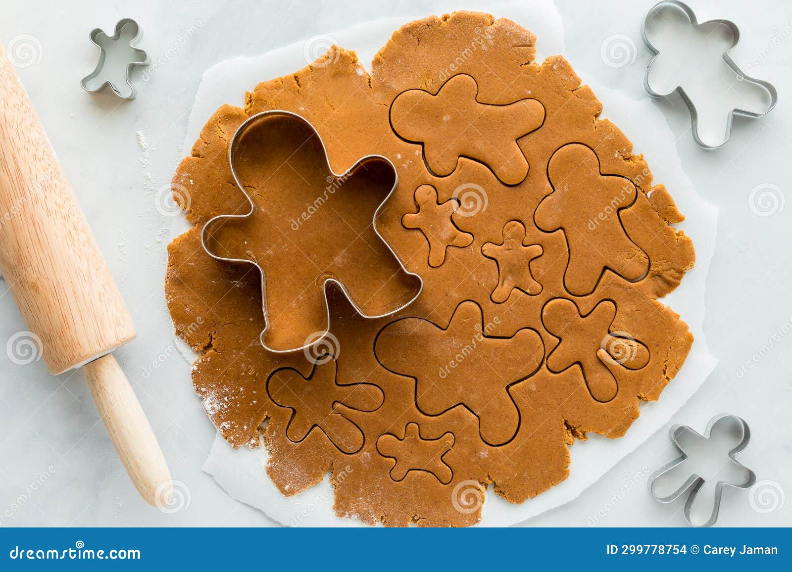 Gingerbread Cookie Dough Rolled Out and Cut into Gingerbread Men. Stock ...