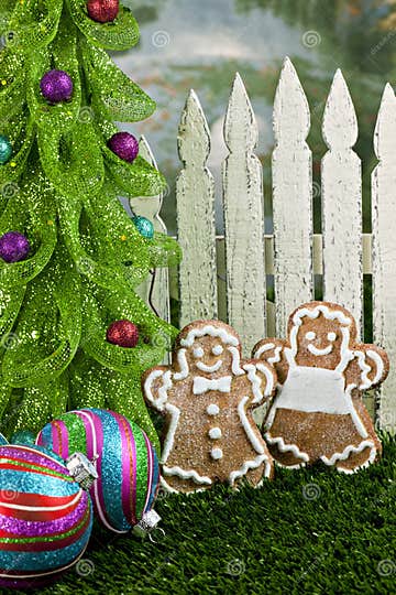 Gingerbread Couple at Fence and Tree Stock Image - Image of cold ...