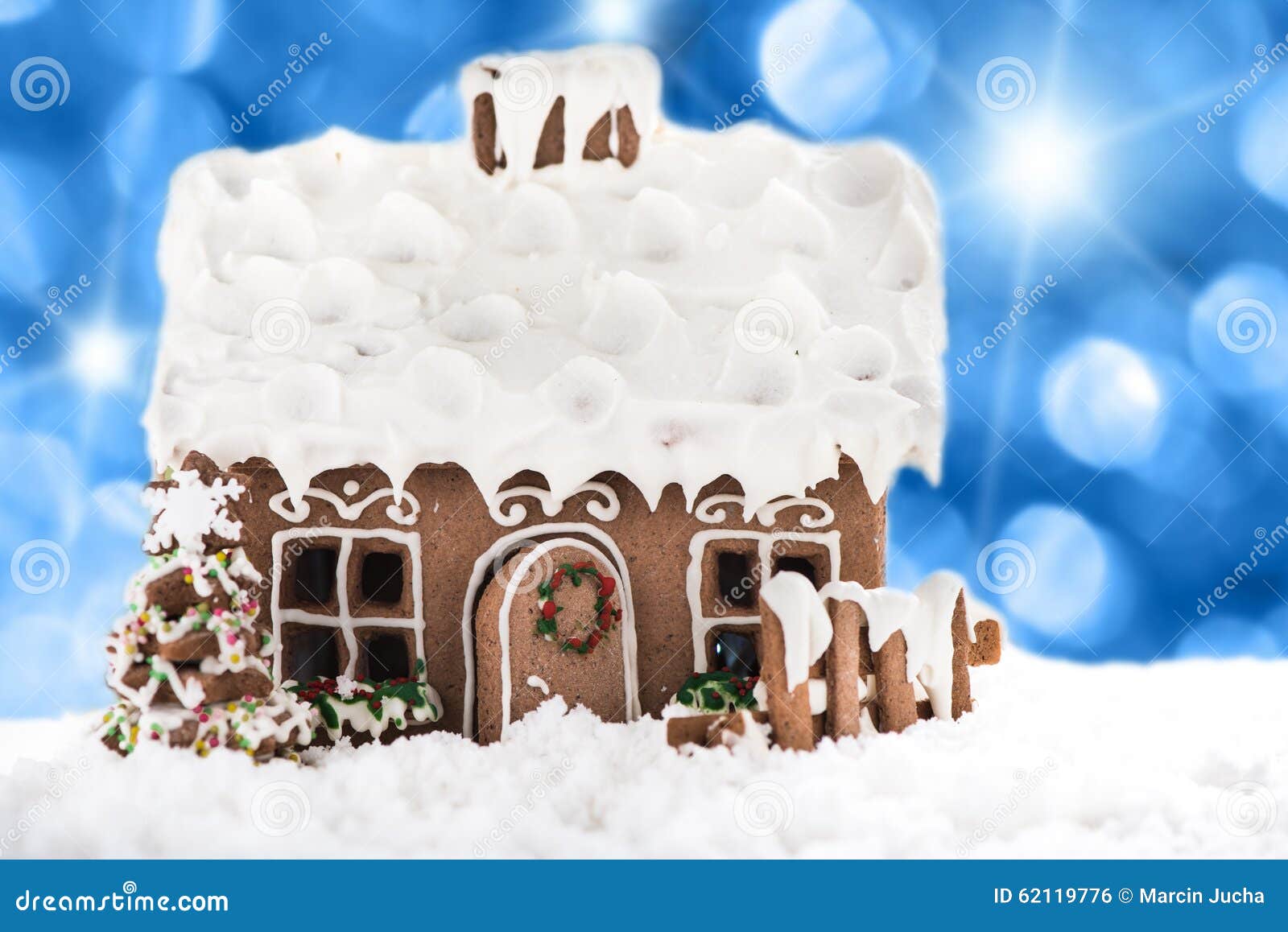 Gingerbread house on snow stock photo. Image of celebration - 62119776