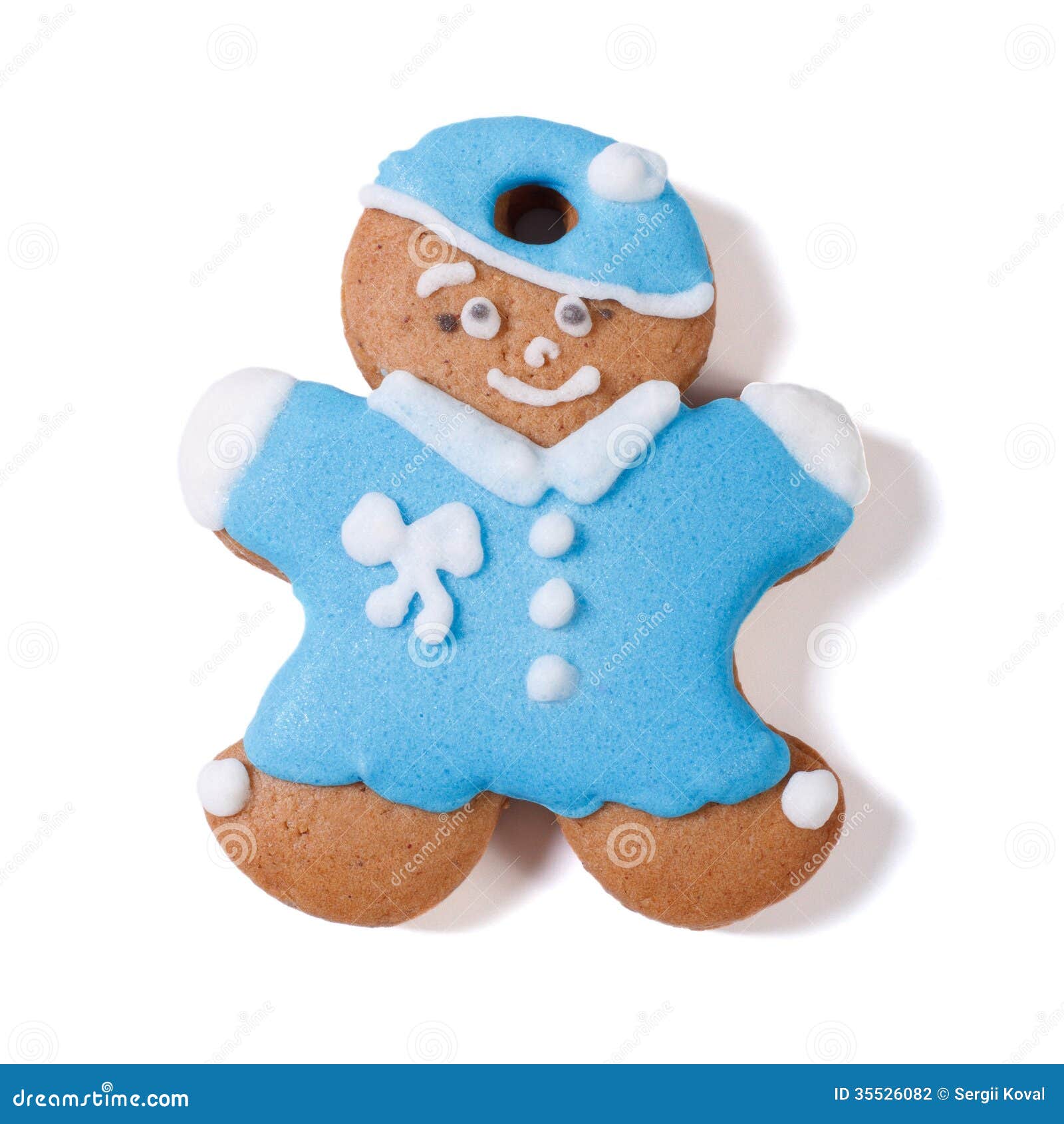Gingerbread Man in a Blue Coat and Hat Isolated Stock Photo - Image of ...